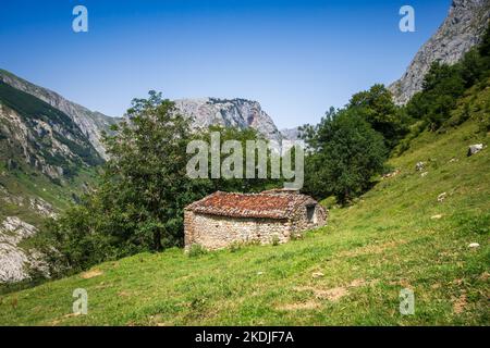 Mountain landscape and sheepfold around Bulnes village, Picos de Europa ...
