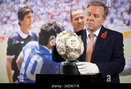 EDITORIAL USE ONLY Auctioneer Graham Budd at an event at Wembley ...