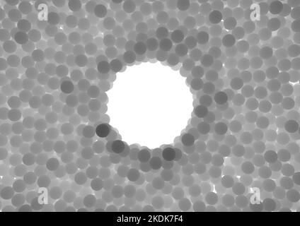 A circular void surrounded by an array of translucent white rubber ...