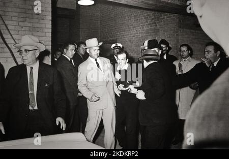 Jack Ruby (52) shoots Lee Harvey Oswald (24). Winner of the 1964 ...