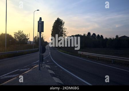 Fork between two lanes in a roundabout in the italian countryside at ...