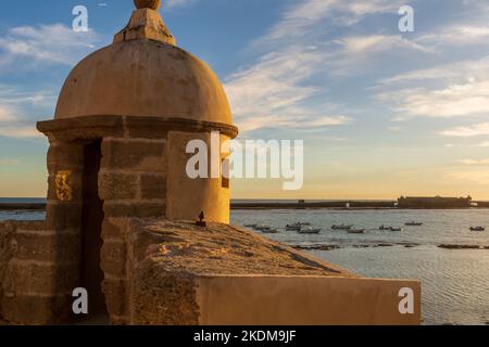 Watchtower of an ancient fortress on a coastal shore Stock Photo - Alamy