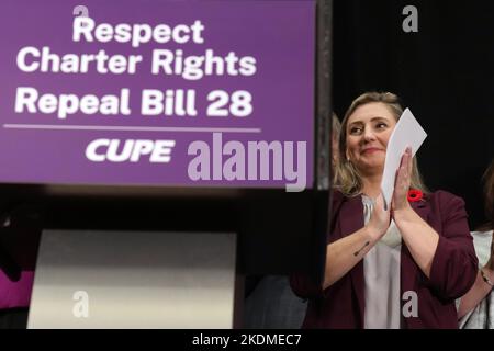 CUPE-OSBCU president Laura Walton, centre, and OPSEU president JP ...