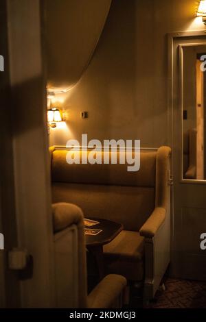 Pullman first class rail travel compartment with old style lamp on ...