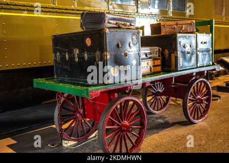 cart or wagon used at a train station to load and haul passengers ...