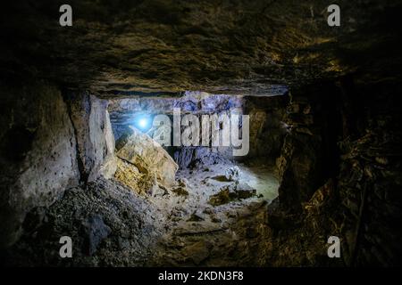 Old abandoned collapsed limestone mine Stock Photo - Alamy