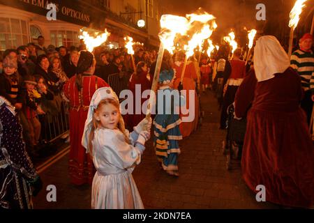 The Borough Bonfire Society dressed in Tudor costume carry flaming ...