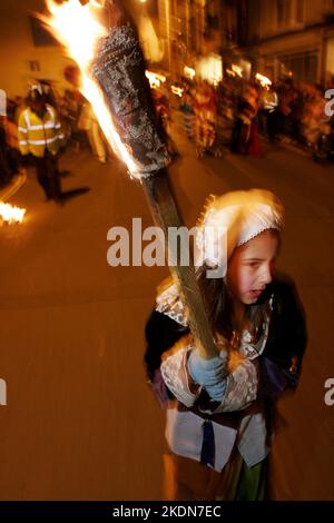The Borough Bonfire Society dressed in Tudor costume carry flaming ...