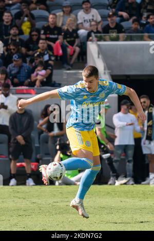 Philadelphia Union forward Mikael Uhre, left, scores during an MLS ...