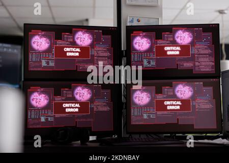 Multiple monitors showing critical error message after cyber crime attack and hacking alert ...