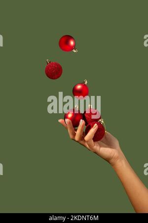 Beautiful girl Santa Claus with dark hair in suit on white background ...