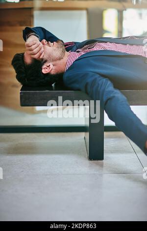 A tired businessman, taking a break Stock Photo - Alamy