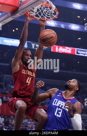 Cleveland Cavaliers' Evan Mobley (4) dunks the ball in front of ...