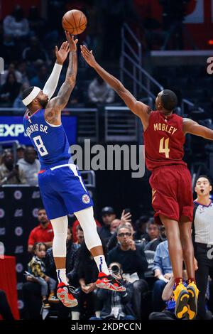 Cleveland Cavaliers' Evan Mobley (4) shoots over Brooklyn Nets' Ziaire ...