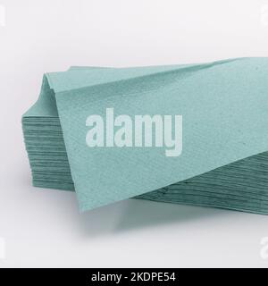 Fragment of stack of the green disposable paper towels, close-up ...