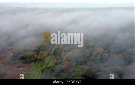 Ramsey, UK. 06th Nov, 2022. The Rothschild Bungalow seen beneath low ...