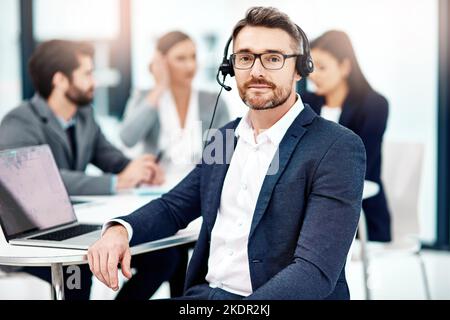 Taking messages during the meeting. Portrait of a male telephone ...