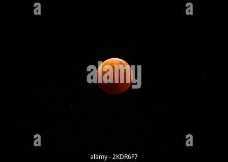 LIANYUNGANG, CHINA - NOVEMBER 8, 2022 - A total lunar eclipse is seen ...