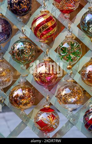 Beautiful artisan hand blown glass Christmas tree hanging baubles on ...