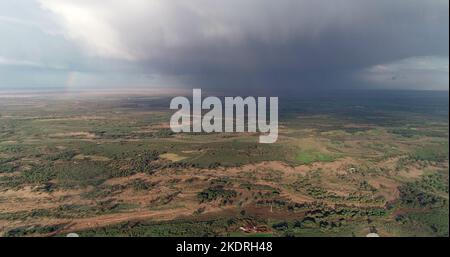 Inner Mongolia mesozoic-cenozoic miracles: half sunny rain, dark clouds ...
