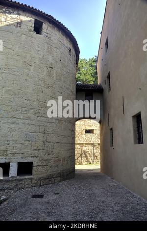 Passageway with an arch between two buildings in a castle Stock Photo ...