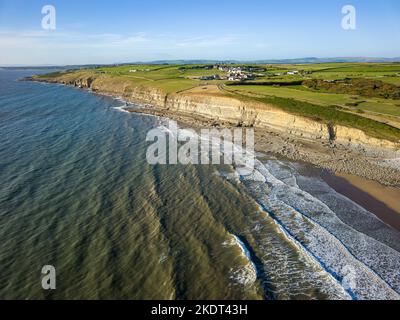 An aerial view of The beach and cliffs at Dunraven bay at Southerndown ...