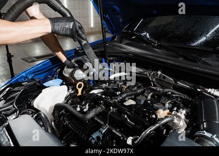 Process of drying car engine after washing with water and chemical ...