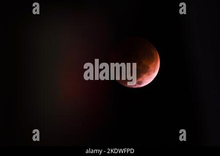 A total lunar eclipse seen over the city of San Salvador (Photo by ...
