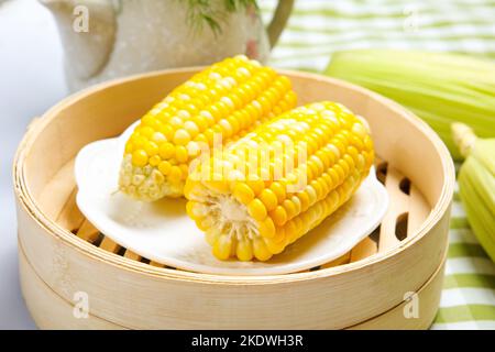 A small amount of steamed corn Stock Photo - Alamy