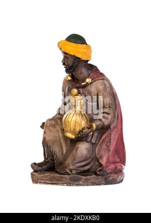 The Christmas magic. Ceramic figure of Balthazar, one of the wise men ...