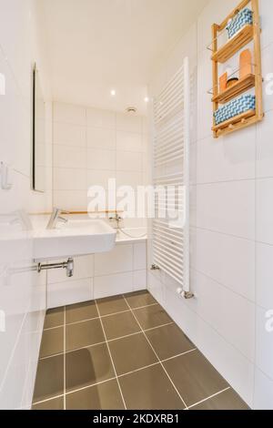 Sinks with mirrors and clean bathtub located near shower box with glass ...