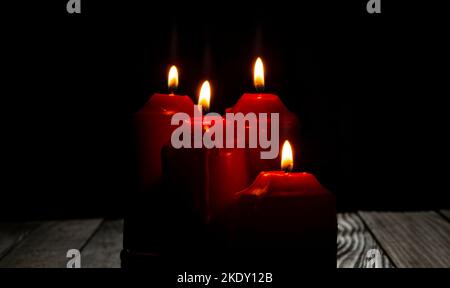 Advent theme Four Red Candles With dark background banner Stock Photo ...