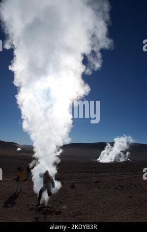 Geothermal Geyser atacama volcano hot steam water Stock Photo - Alamy