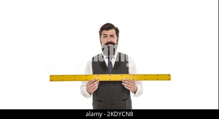 school man measure height with ruler isolated on yellow. school man ...