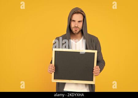 guy make announcement. male behind chalkboard. place for useful ...