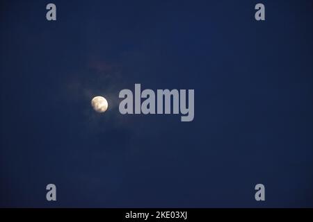 half moon cover by spreading cloud in night Stock Photo - Alamy