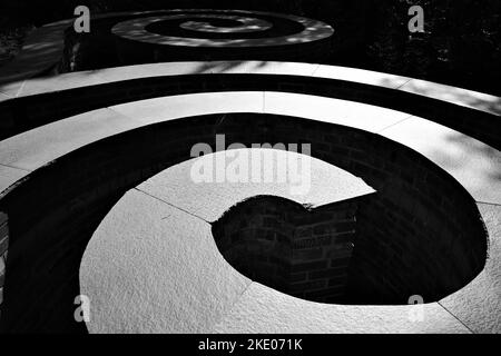 A monochrome shot of the round labyrinth in the landscape Stock Photo ...
