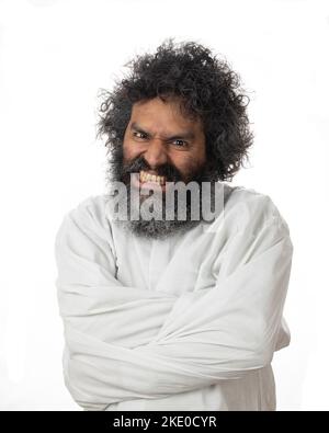 A vertical shot of a male psychopath grinding teeth with a weird facial ...