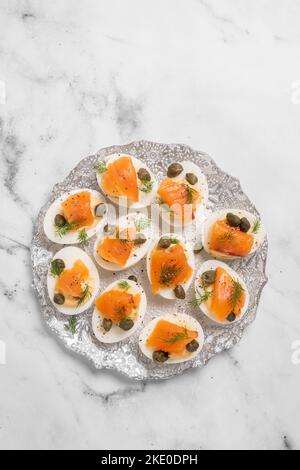 delicious smoked salmon deviled eggs with capers and dill Stock Photo ...