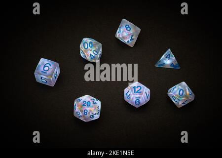 A set of seven polyhedral dice used to play table top role playing ...