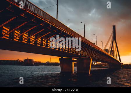 The beautiful view of the Vansu Bridge crossing the Daugava river at ...