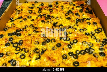 Greasy fat huge olive pizza in Playa del Carmen Quintana Roo Mexico ...