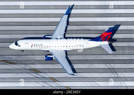 Delta Connection Airlines Embraer ERJ-175 regional jet airliner departs ...