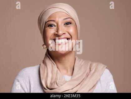 Portrait, fashion or religion with a happy saudi woman on a blue sky ...