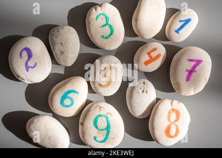 Colorful stones signed by numbers, an alternative method of children ...