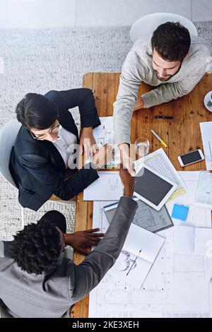 Great things happen when great minds come together. High angle shot of ...