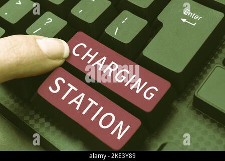 Hand writing sign Charging Station, Business concept places where ...