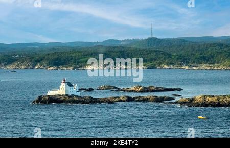 Lighthouse On The Rocks Of Norwegian Island Of Runde Stock Photo - Alamy