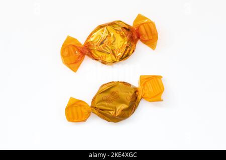 new Quality Street recyclable wax-based paper wrapper Stock Photo - Alamy