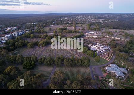 Aerial view of Woronora Cemetery and Sutherland suburb surrounded by ...